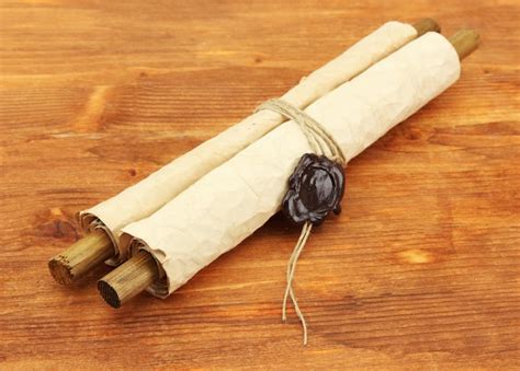 Premium Photo Old Scroll On Wooden Background