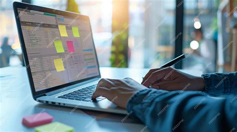 Business Developer Using Kanban Board Framework On Laptop Screen Premium Ai Generated Image