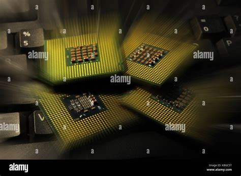Close Up Of Computer Processor CPU On A Keyboard Background Tecnology Concept Stock Photo Alamy