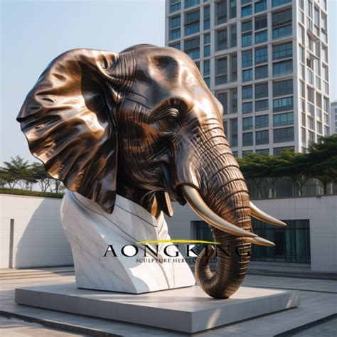 White Bronze Elephant Head Sculpture Wearing A Shirt