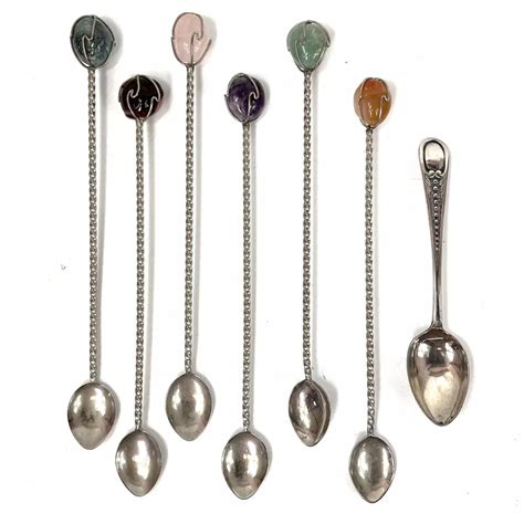 A Set Of Six Cocktail Spoons And One Silver Spoon In Antique Silver Spoons