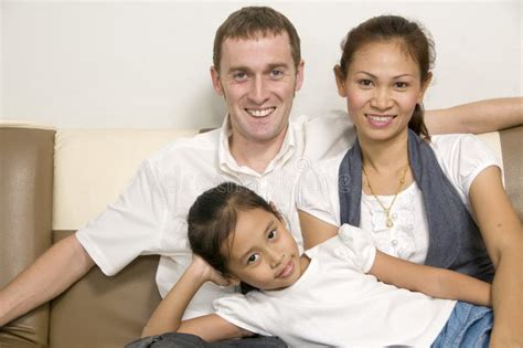 Familia Joven Con El Ni O Imagen De Archivo Imagen De Internacional