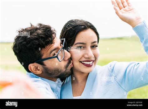 Selfie Of A Young Couple Kissing Lifestyle Of A Cute Couple Taking A