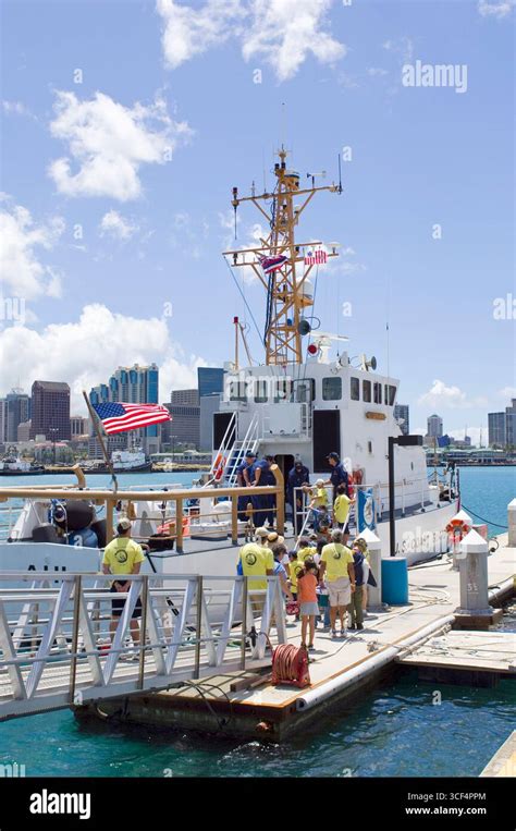 Group Of Cub Scouts Boarding The Uscg Ship Ahi For A Tour Honolulu