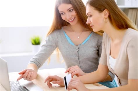 Premium Photo Two Friends Or Sisters Talking Taking A Conversation At