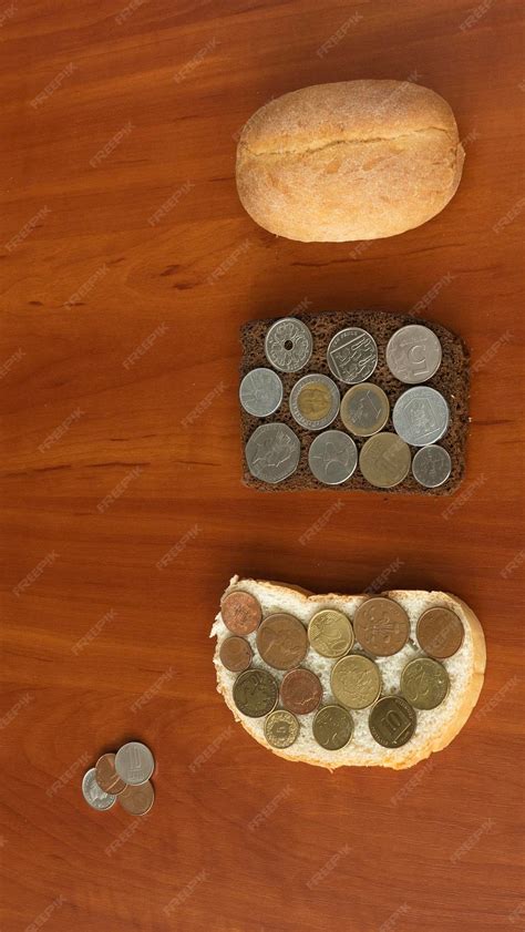 Premium Photo Sandwiches With Different Coins A Bun And Few Coins On