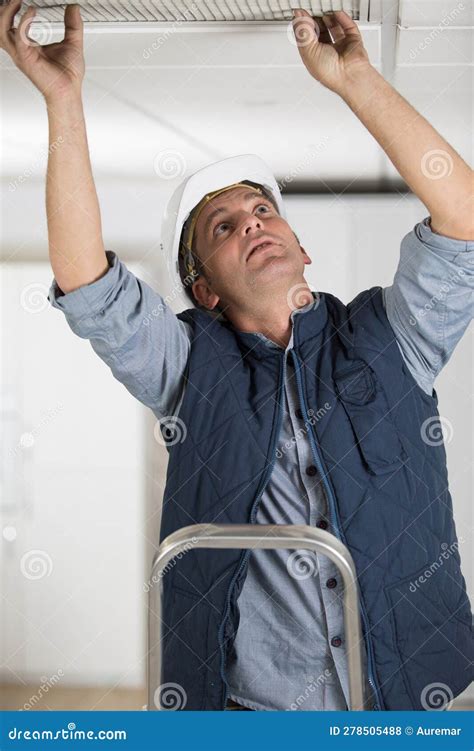 Man In Builder Uniform Installing Suspended Ceiling Stock Photo Image Of Flat Blue 278505488