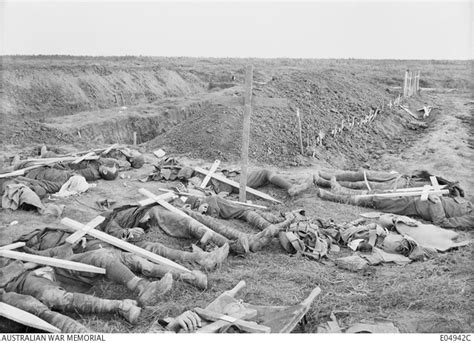 Bodies Of American Troops Laid Out In An American Cemetery Near The
