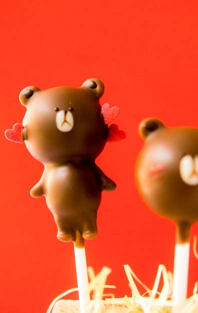 Premium Photo Close Up Of Candy Over Red Background