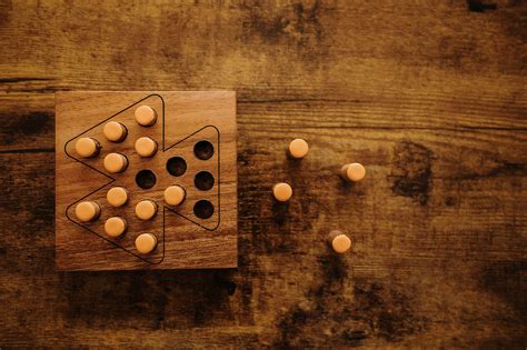 Triple Triangle Peg Jumping Puzzle Puzzled