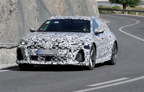 2026 Audi Rs6 Avant Shows Massively Flared Wheel Arches Oval Exhaust