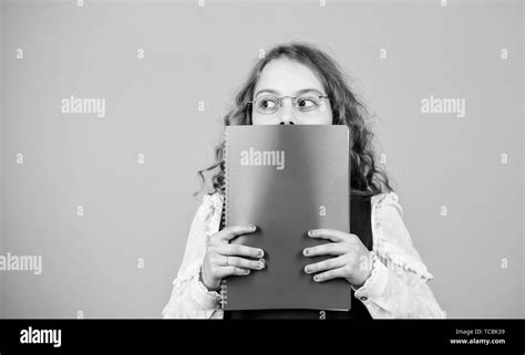 Small Girl With Paper Folder Notebook For Diary Notes Study Lesson Knowledge And Education