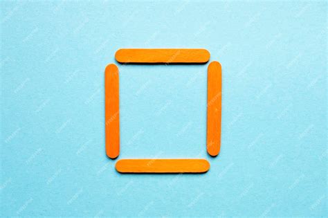 Premium Photo Orange Square On A Blue Background Geometric Figure