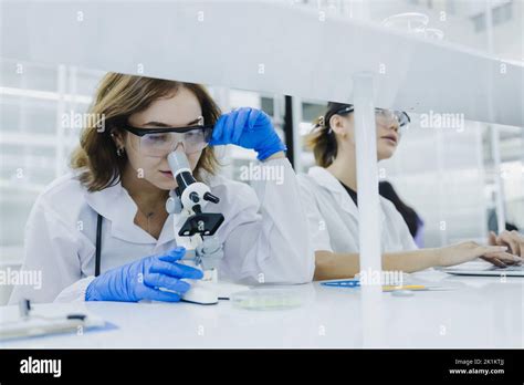 Female Researcher Medical Scientist Or Doctor Working And Checking