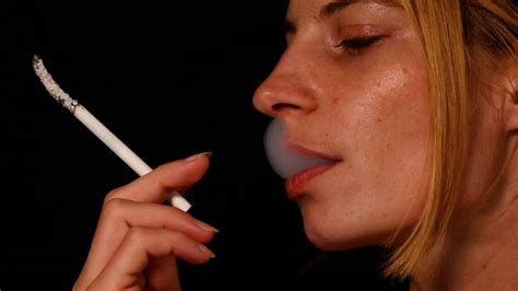 Eve The Glamorous Blonde Enjoys Her Cigarette In Mesmerizing Slow Motion Eves Smoking