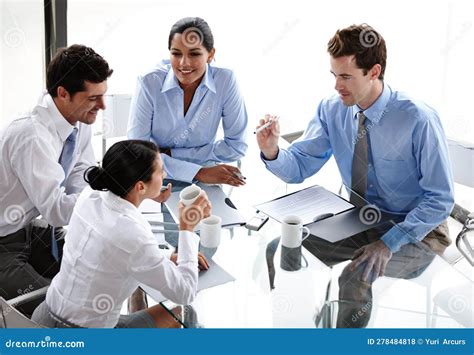 Boardroom Brainstorming A Business Team Collaborating On A Project In The Boardroom Stock