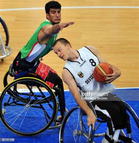 Irans Ebrahim Ahmadi Attempts To Block A Shot As Germanys Andre