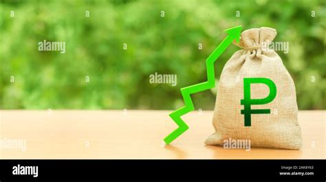 Russian Ruble Money Bag And Green Up Arrow Strengthening Of National Currency Revaluation