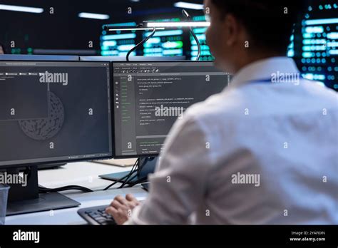 Programmer In Server Farm Checking Recovery Plan Monitoring Data Center Energy Consumption