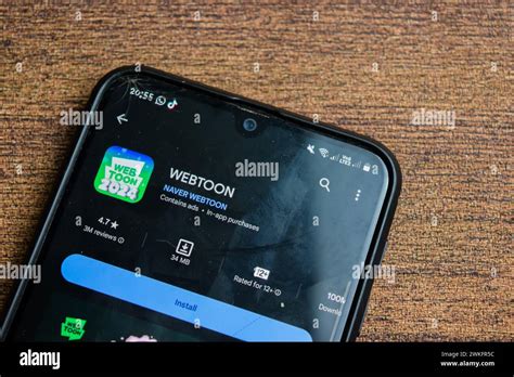 webtoon 2024 application on smartphone screen webtoon is a freeware