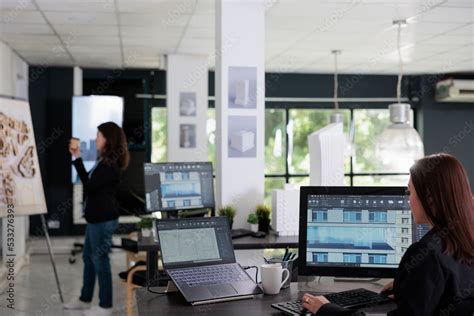 Architect Working In 3d Modeling Software Multi Store Building Model