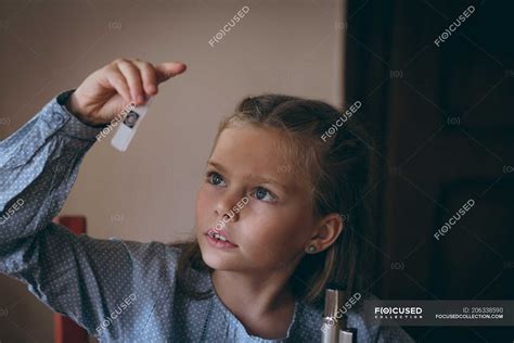 Girl Experimenting Microscope Slide Microscope At Home Looking Casual Clothing Stock Photo