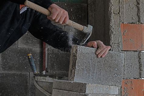 The Builder Is Chiselling Bricks With A Chisel Stock Image Image Of Equipment Build