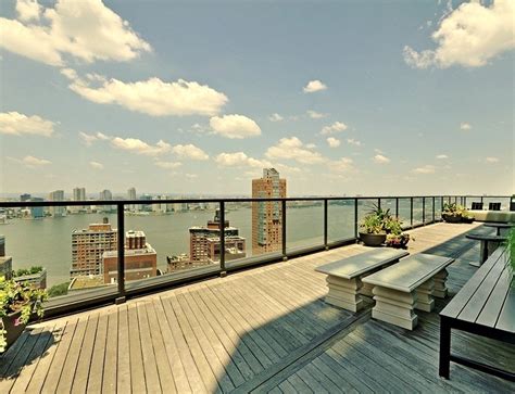 Beautiful View Of Water And City From Luxury Penthouse Patio Daniel