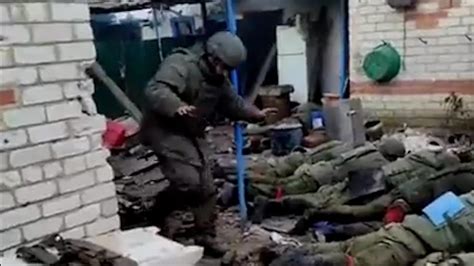 Videos Appear To Show Ukrainian Troops Shooting Surrendering Russians