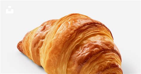 하얀 표면 위에 앉아 있는 크루아상 사진 Unsplash의 무료 크루아상 이미지