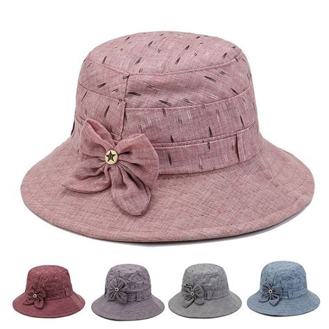 2022 새로운 패션 한국어 어부 모자 숙녀 야외 해변 해변 태양 모자 여성 트렌드 솔리드 컬러 보우 캔버스 모자 5 색 모자 및 모자
