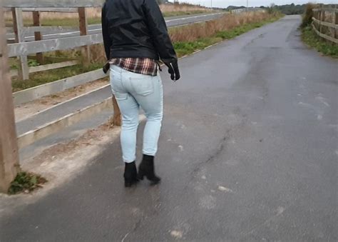 Public Wetting And Rewetting Tight Blue Jeans And Leather Jacket