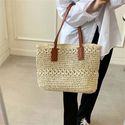패션 짠된 어깨 가방 대용량 여자 등나무 밀 짚 가방 여름 새 휴일 비치 가방 여성 브랜드 디자이너 가방 여름 가방