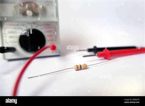 Electric Resistor With An Analog Ohmmeter Probes Electrical Works Concept Focused On