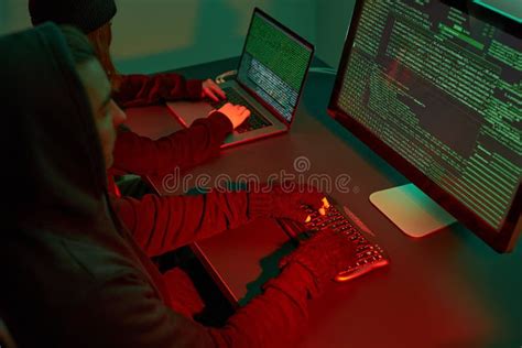 Anonymous People Using Computer And Programming To Break Code Cyber