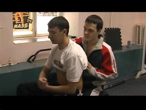 Two Young Mates Are Supporting Each Other In The Gym