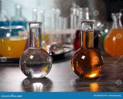 Dark Laboratory Room With Beakers With Colourful Fluids Created Using Generative Ai Technology