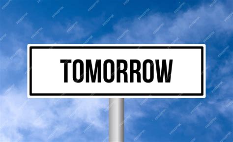 Premium Photo | Tomorrow road sign on blue sky background