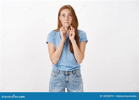 Cute Redhead Woman Hopes God Hears Prayers Biting Lower Lip While