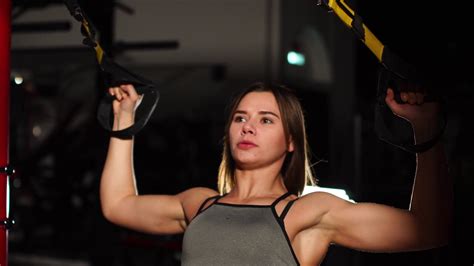 Fit Woman Performing Pull Ups On Gymnastic Stock Footage Sbv 321750030