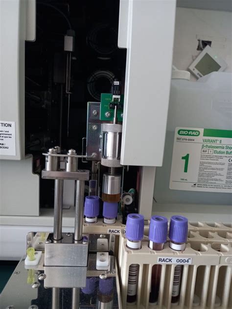 Automated Machine In Laboratory With Vials