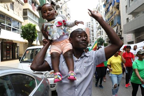Take A Look At These Powerful Photos From Sundays Migrant Workers Protest