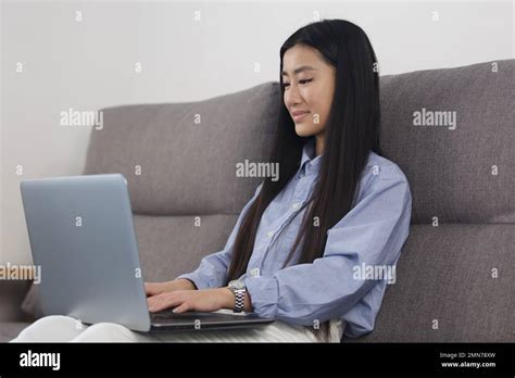 Vietnamese Poc Girl Typing Code On Computer Cheerful Bipoc Female