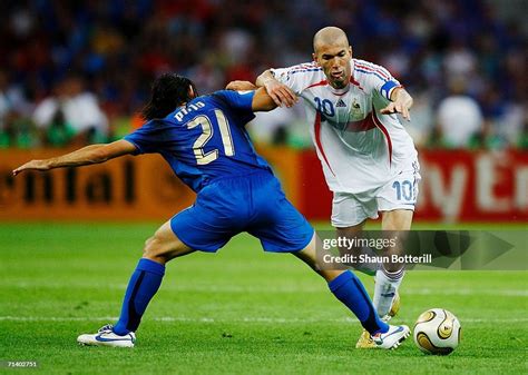 Zinedine Zidane Of France Is Challenged By Andrea Pirlo Of Italy
