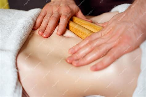 Premium Photo Woman Having A Creole Massage Of The Abdominal Area