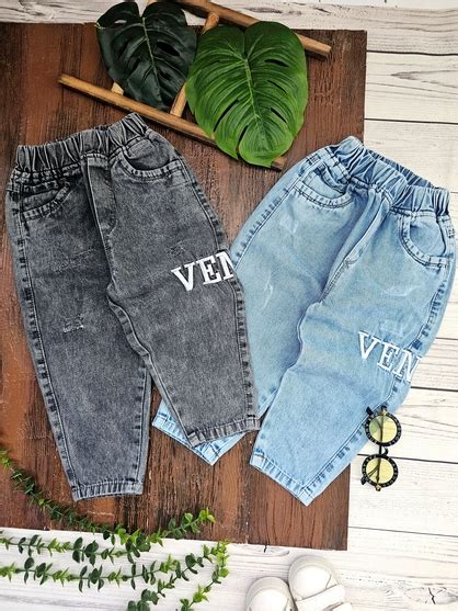 شلوار جین مام پسرانه آماج فروشگاه کودک نهال بیبی شاپ