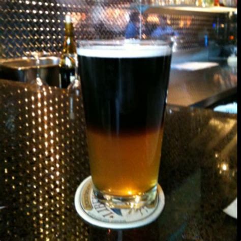 Black And Blue Guinness Layered On Top Of Blueberry Beer At River