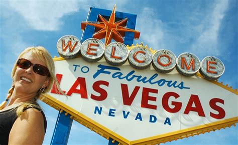 Beautiful Lady Posing In Front Of Las Vegas Sign Photo Background And