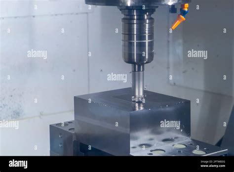 CNC Machine Tool Cutting Raw Material In Factory Stock Photo Alamy