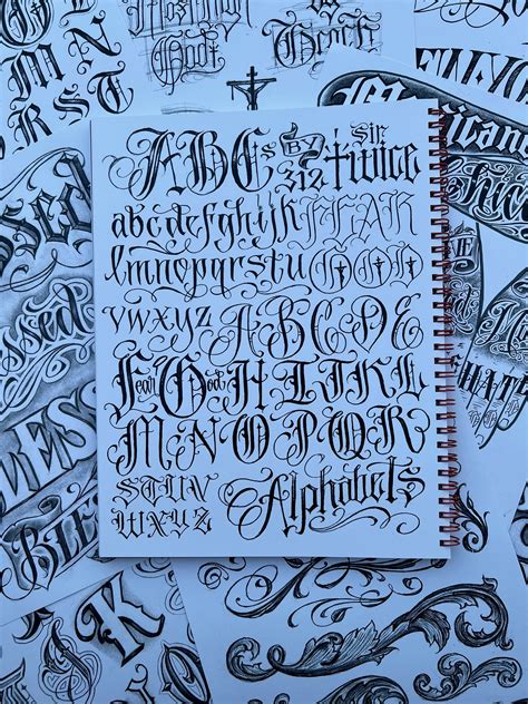 Cursive Chicano Lettering Tattoo